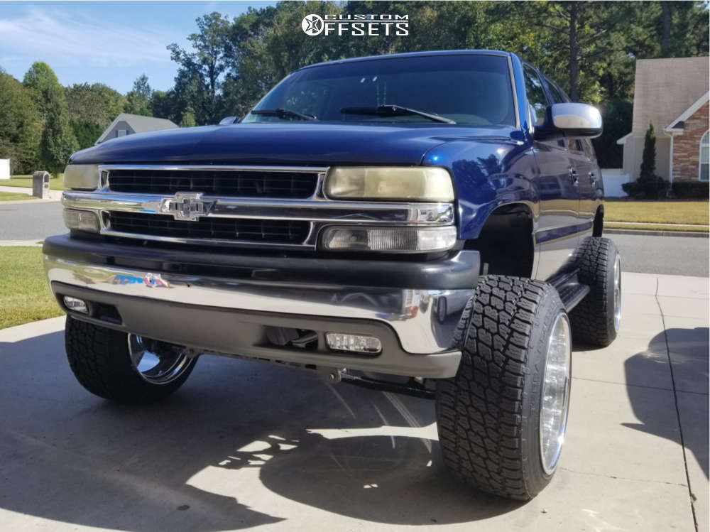 2002 Chevrolet Tahoe with 22x14 -70 TIS Forged F50p2 and 33/12.5R22 ...