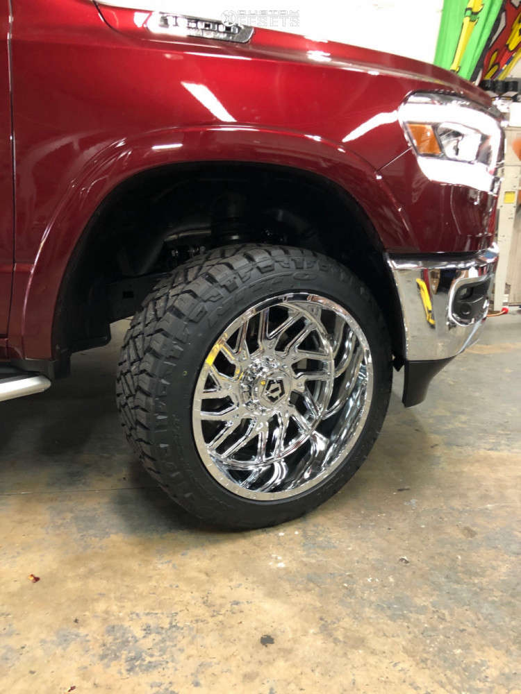 2019 Ram 1500 with 22x12 -46 TIS 544C and 33/12.5R22 Nitto Ridge ...