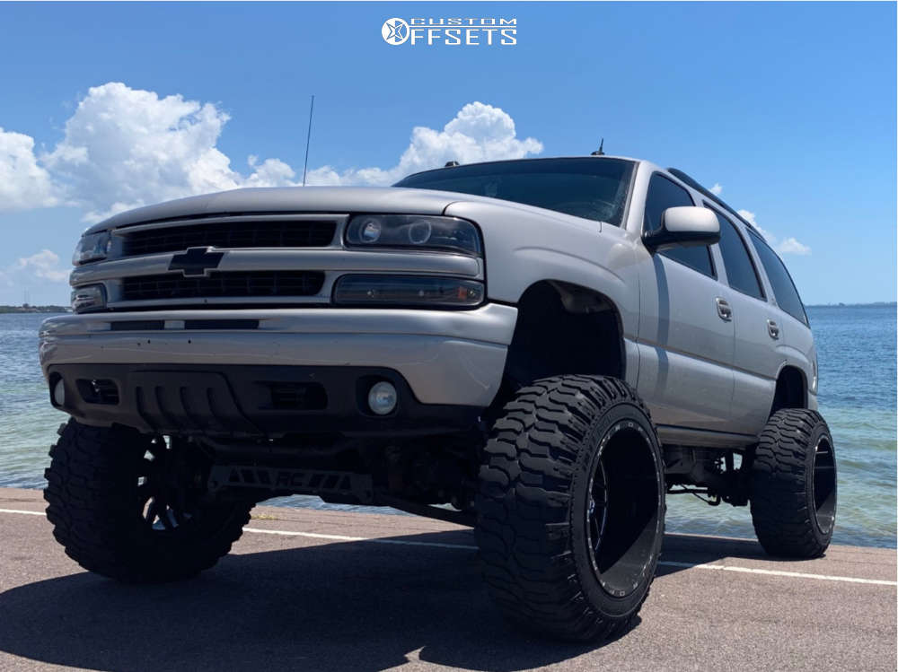 2004 Chevrolet Tahoe with 22x14 -76 TIS 544BM and 37/13.5R22 Super ...
