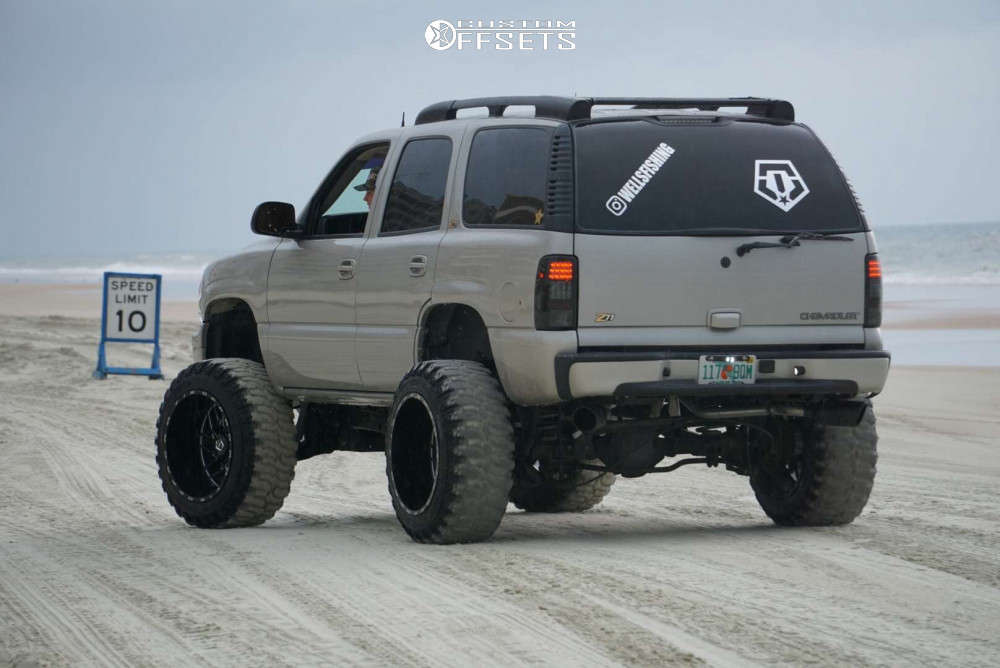 2004 Chevrolet Tahoe with 22x14 -76 TIS 544BM and 37/13.5R22 Super ...