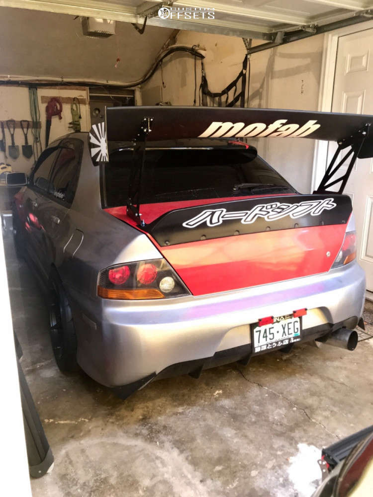 2003 Mitsubishi Lancer with 18x9.75 20 XXR 527 and 265/35R18 Toyo Tires ...