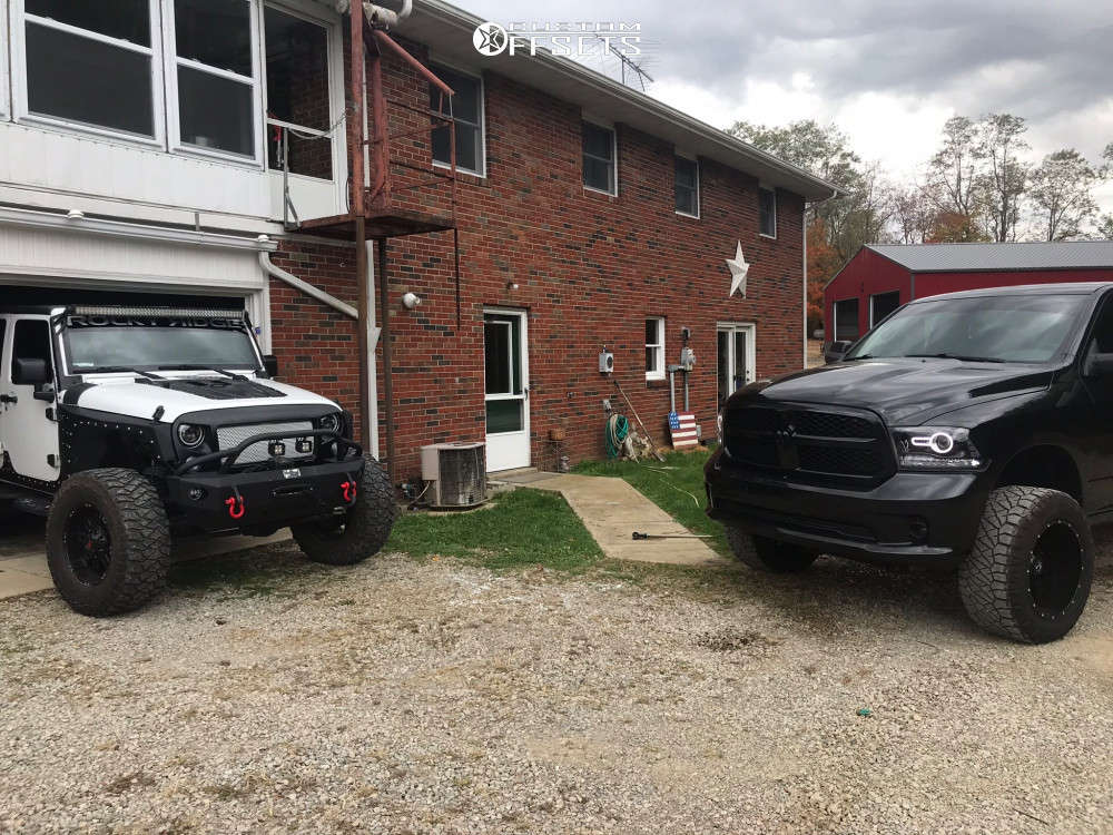 2015 Ram 1500 with 20x12 -44 TIS 535B and 35/12.5R20 Nitto Ridge ...