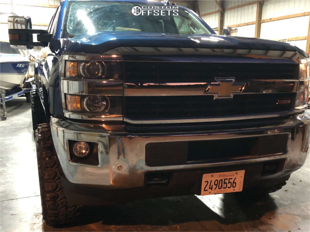2016 Chevrolet Silverado 2500 HD with 22x12 -44 Hostile Sprocket and 33/12.5R22 Gladiator Xcomp ...