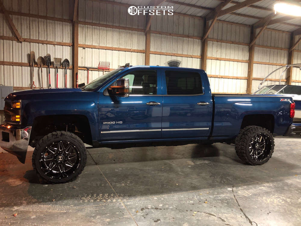 2016 Chevrolet Silverado 2500 HD with 22x12 -44 Hostile Sprocket and 33/12.5R22 Gladiator Xcomp ...
