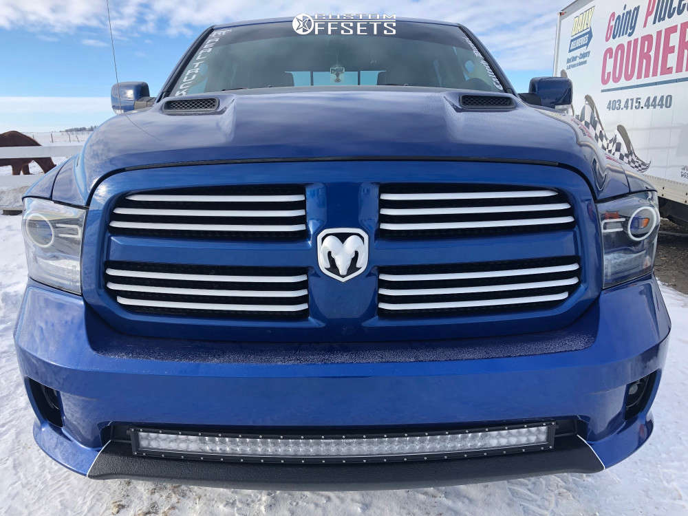 2015 Ram 1500 with 20x10 -18 Fuel Contra and 33/12.5R20 Toyo Tires Open ...