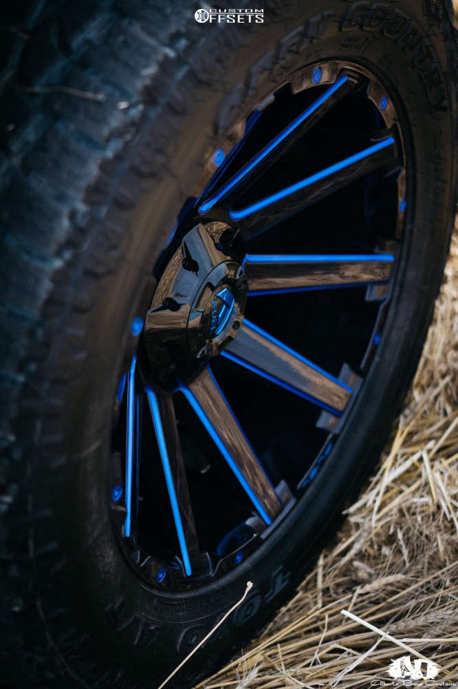 2015 Ram 1500 with 20x10 -18 Fuel Contra and 33/12.5R20 Toyo Tires Open ...