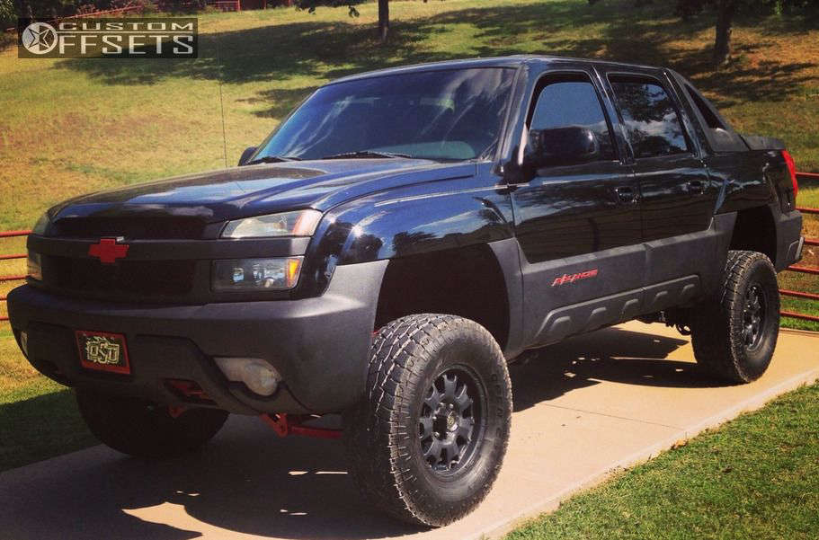 2003 Chevrolet Avalanche with 17x8 0 American Racing ATX Series and 35/ ...