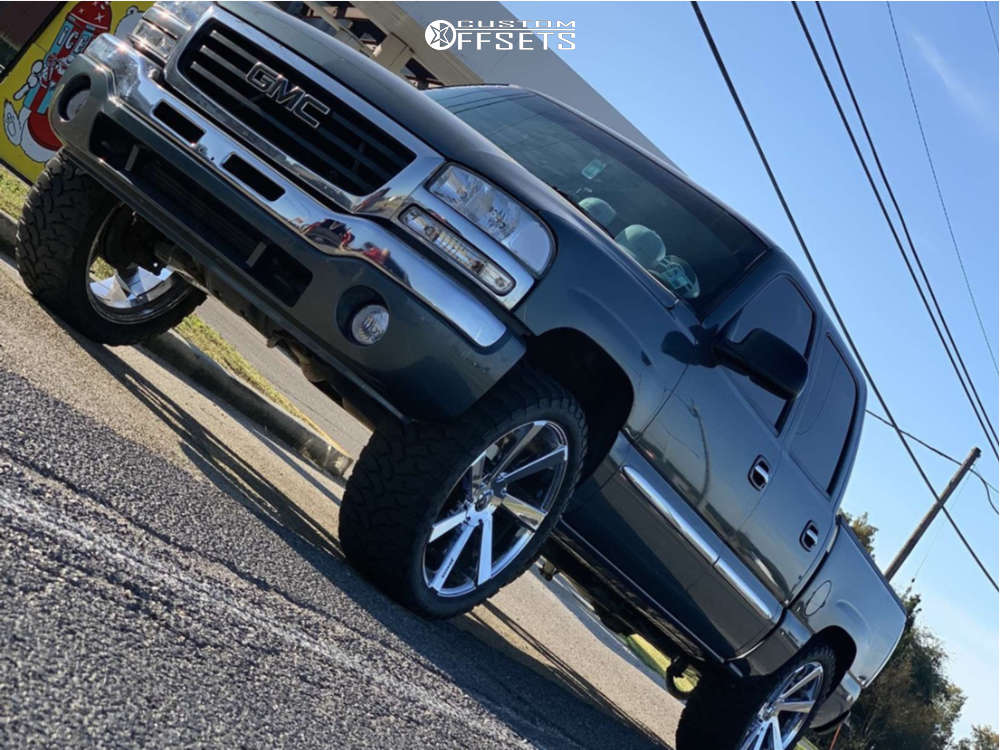 2006 GMC Sierra 1500 with 24x10 33 DUB Directa and 35/12.5R24 Comforser ...