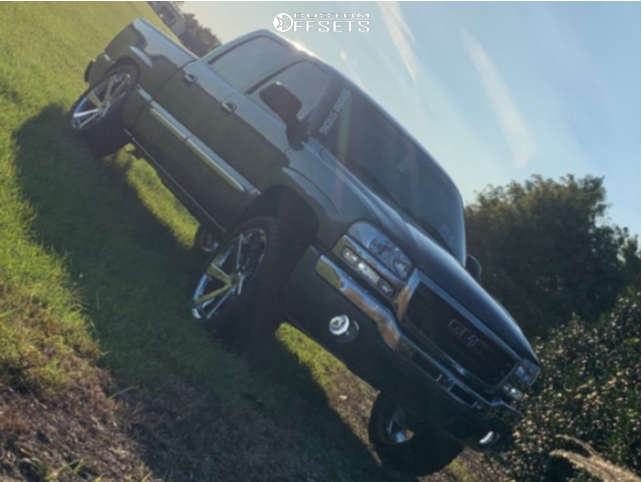 2006 GMC Sierra 1500 with 24x10 33 DUB Directa and 35/12.5R24 Comforser ...