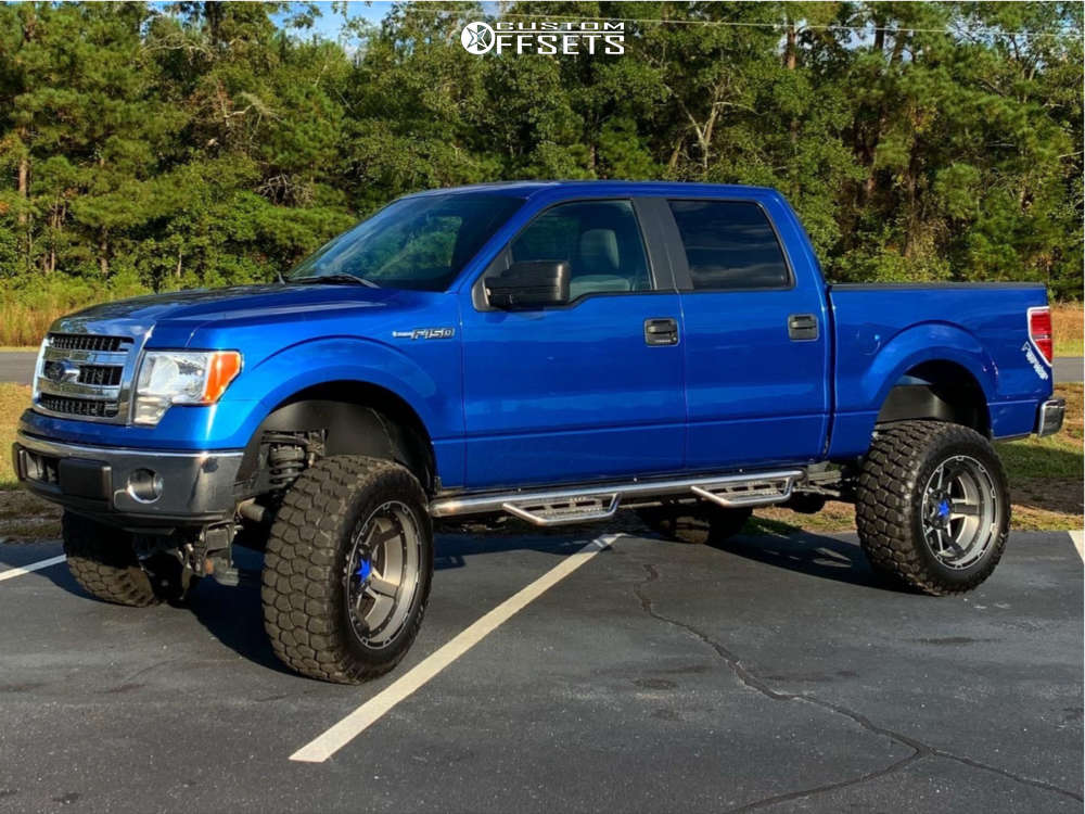 2014 Ford F-150 with 22x12 -44 XD Rockstar 3 and 37/13.5R22 Ironman All ...