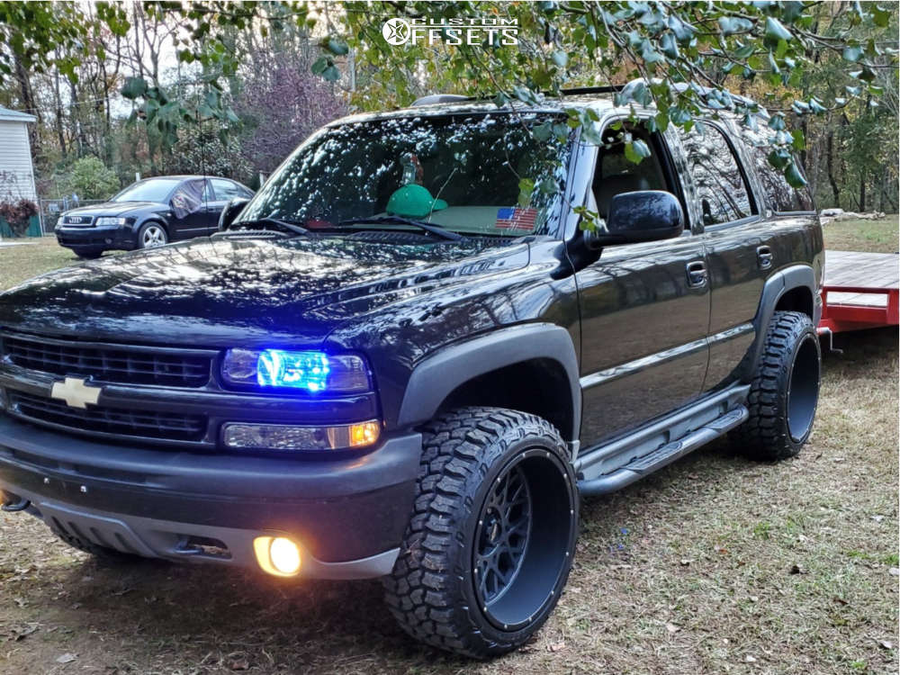 2003 Chevrolet Tahoe with 22x12 -51 Vision Rocker and 33/12.5R22 Mud ...