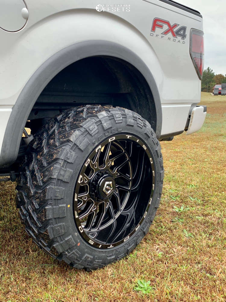 2013 Ford F-150 with 22x12 -44 TIS 544BM and 35/12.5R22 Fuel Gripper Xt ...