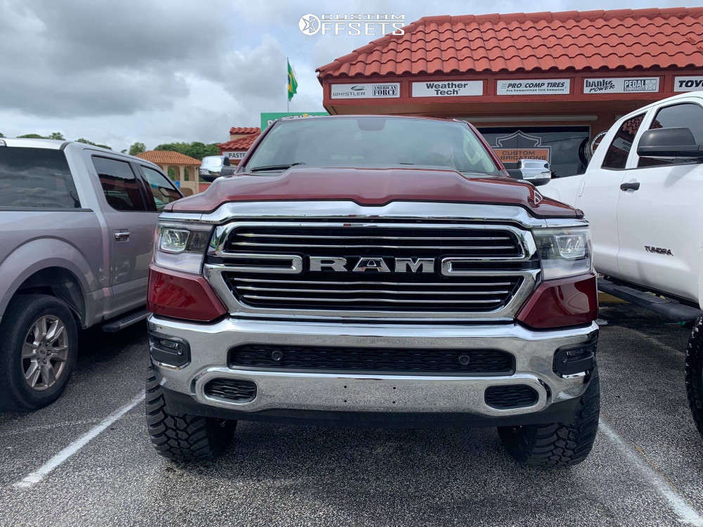 2020 Ram 1500 with 20x10 -24 Moto Metal Mo962 and 35/12.5R20 AMP Mud ...