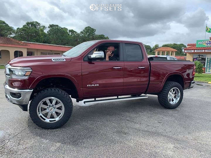 2020 Ram 1500 with 20x10 -24 Moto Metal Mo962 and 35/12.5R20 AMP Mud ...