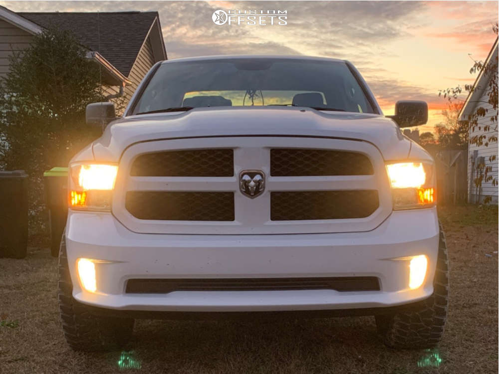 2018 Ram 1500 with 18x10 -44 Black Rhino Raze and 35/12.5R18 Mickey ...