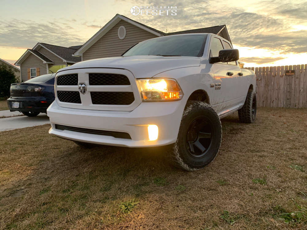 2018 Ram 1500 with 18x10 -44 Black Rhino Raze and 35/12.5R18 Mickey ...