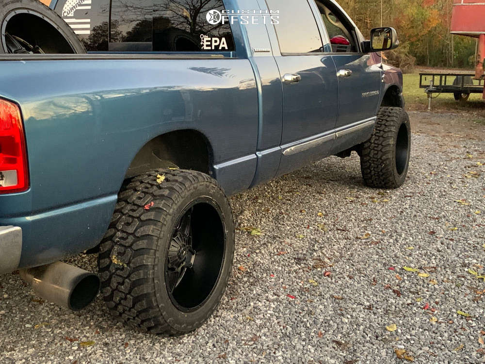 2006 Dodge Ram 3500 with 22x12 -44 TIS 543B and 35/13.5R22 Patriot ...