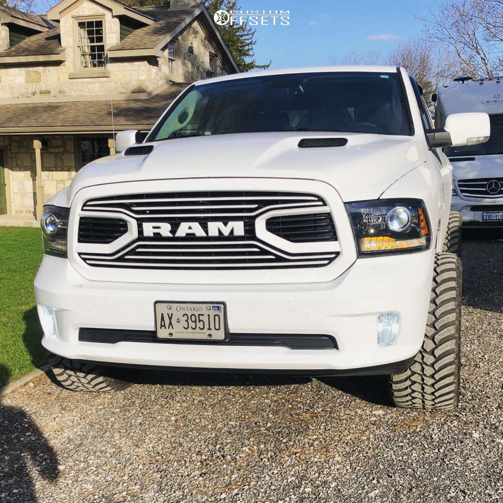 2018 Ram 1500 with 22x12 -44 TIS 544BM and 325/50R22 AMP Mud Terrain ...