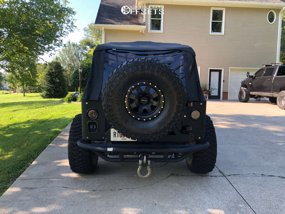 1993 Jeep Wrangler with 15x8 -24 Raceline Defender and 35/12.5R15 ...