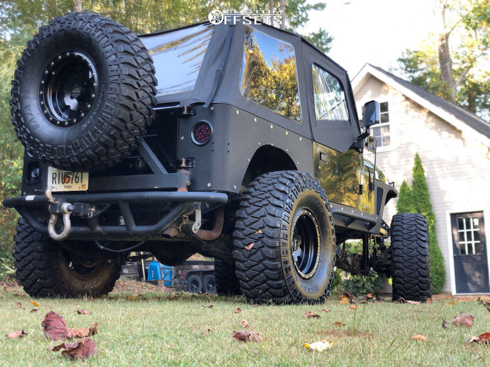 1993 Jeep Wrangler with 15x8 -24 Raceline Defender and 35/12.5R15 ...