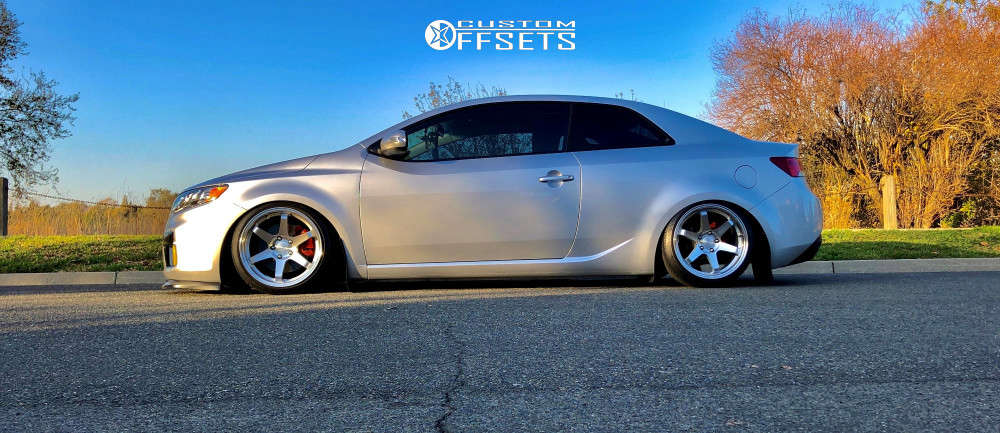 2010 Kia Forte Koup with 17x9 30 Varrstoen Es2 and 205/40R17 Nankang NS ...