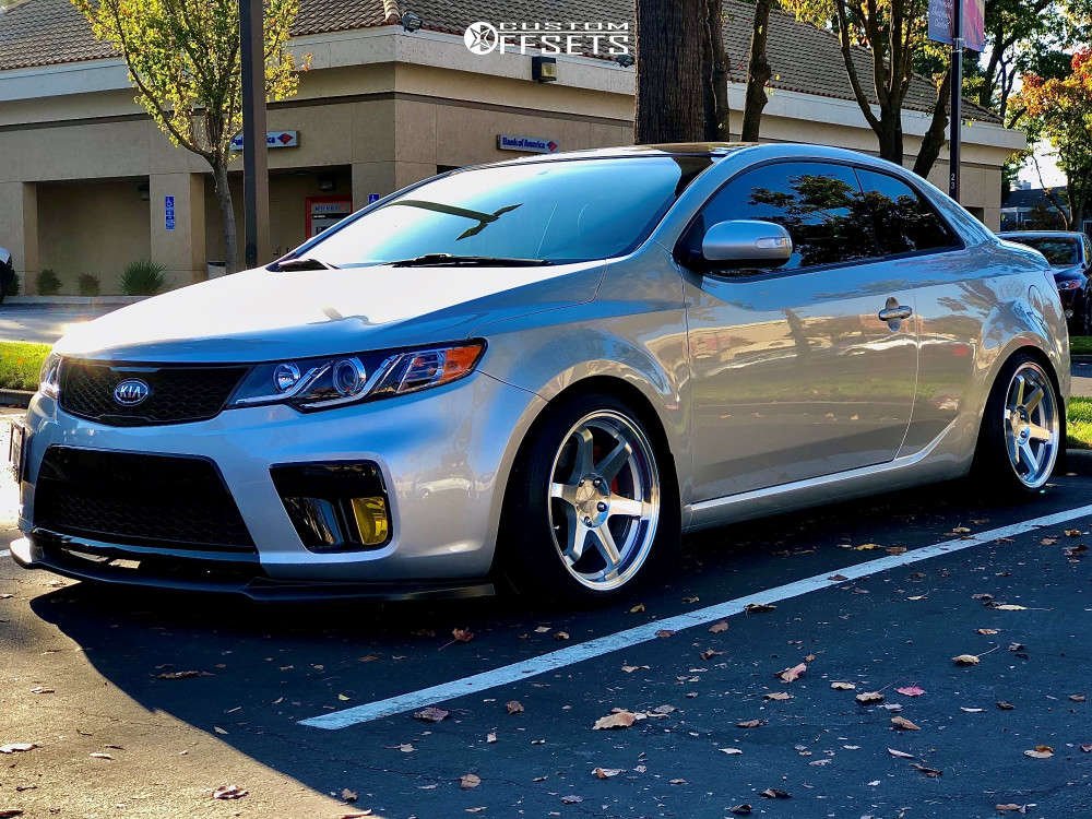 2010 Kia Forte Koup with 17x9 30 Varrstoen Es2 and 205/40R17 Nankang NS ...