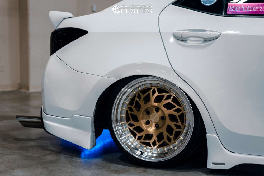 2014 Toyota Corolla with 18x9.5 38 Regen5 R32 and 215/35R18 Achilles ...