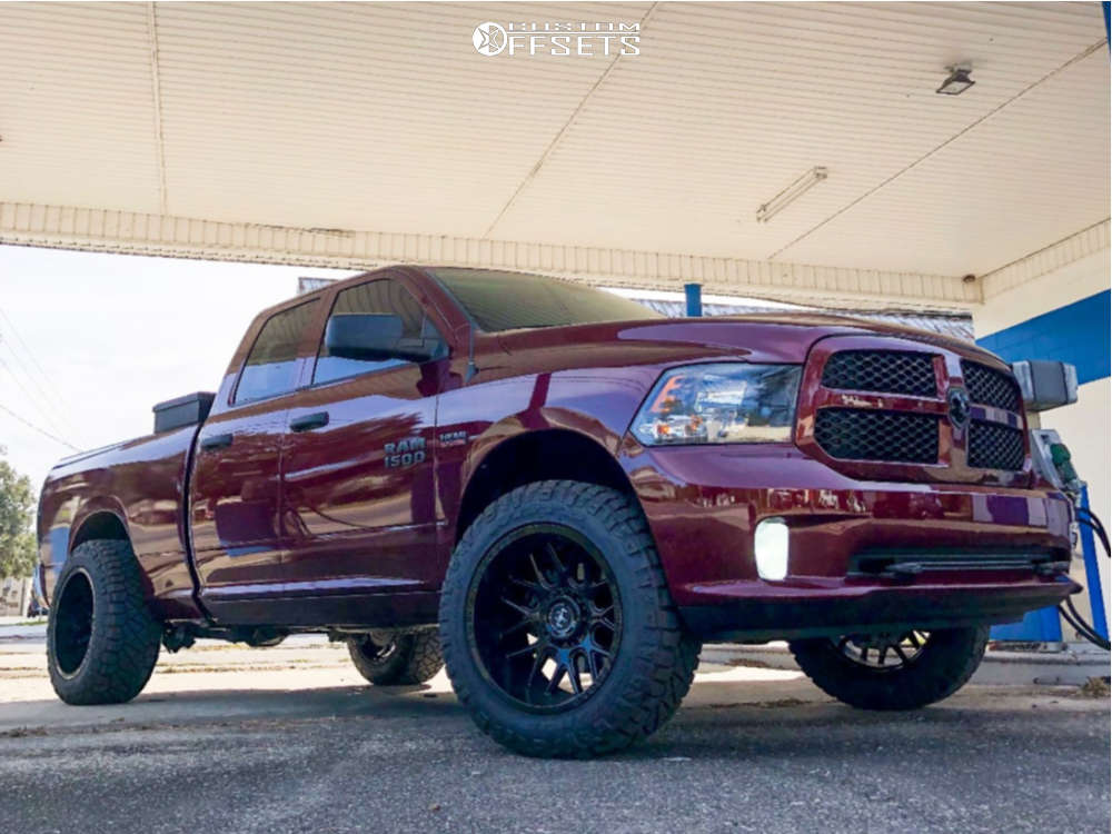 2017 Ram 1500 with 20x12 -44 Motiv Offroad Magnus and 33/12.5R20 Nitto ...