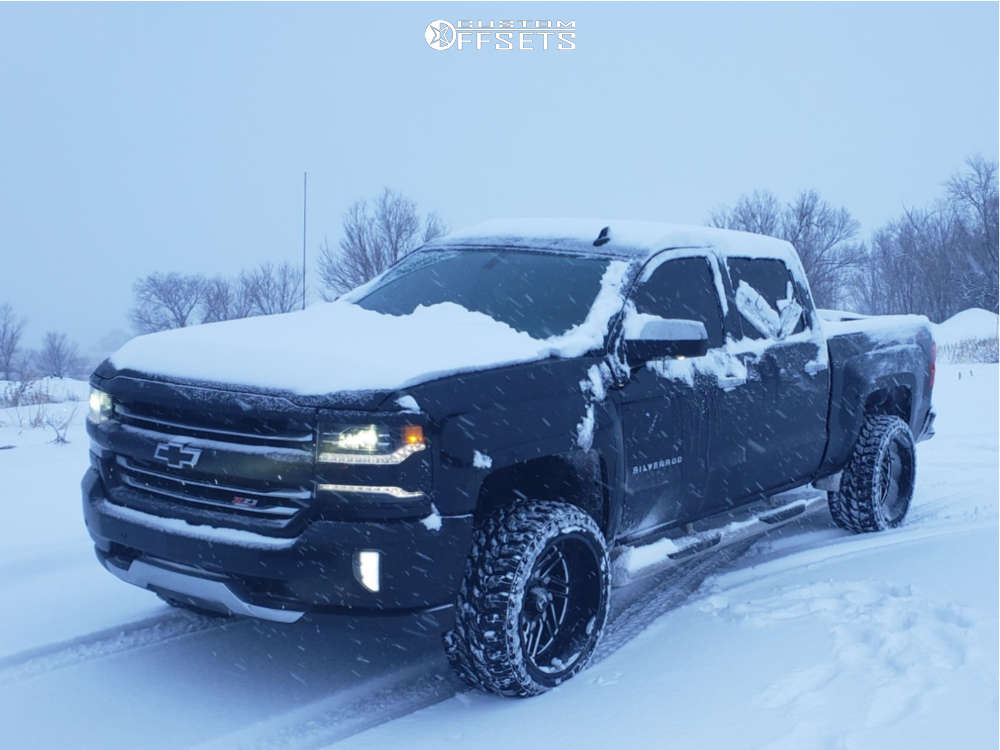2016 Chevrolet Silverado 1500 with 22x12 -44 Hostile Jigsaw and 33/12.5R22 Red Dirt Road M/t and ...