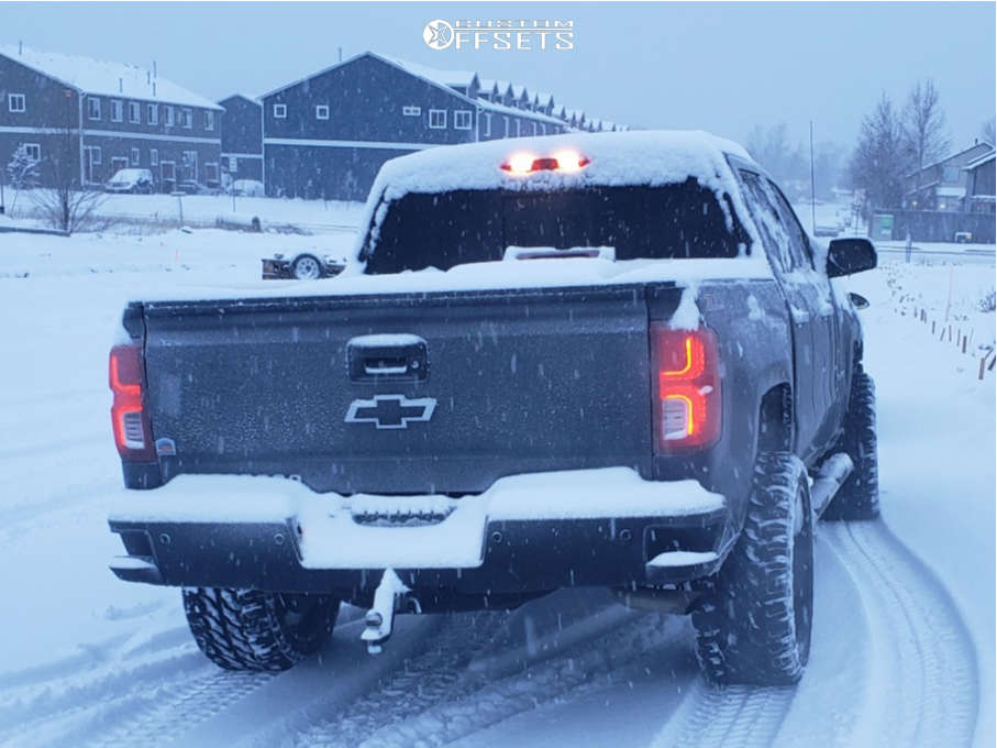 2016 Chevrolet Silverado 1500 with 22x12 -44 Hostile Jigsaw and 33/12.5R22 Red Dirt Road M/t and ...