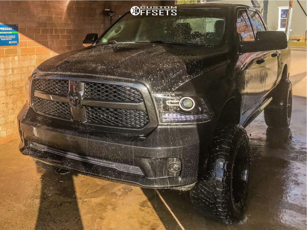 2015 Ram 1500 with 20x12 -44 TIS 535B and 35/12.5R20 Nitto Ridge ...