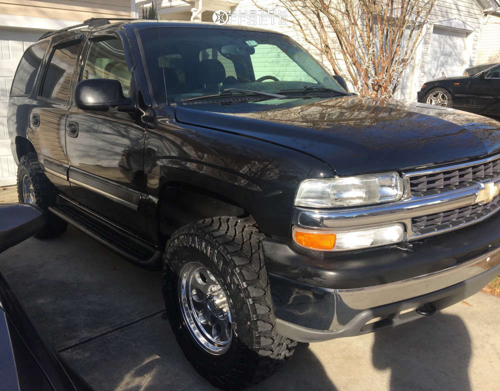 2004 Chevrolet Tahoe with 17x9 -6 Pro Comp 69 and 295/70R17 Yokohama ...