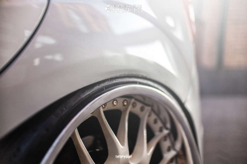 2013 Ford Focus with 18x9.5 30 Imperi and 215/40R18 Triangle and ...