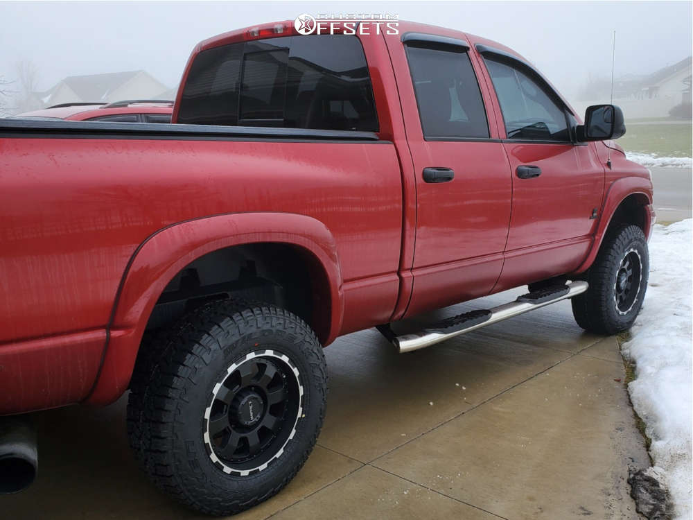 2006 Dodge Ram 2500 with 18x9 -12 Impact Destroyer and 275/70R18 Falken ...