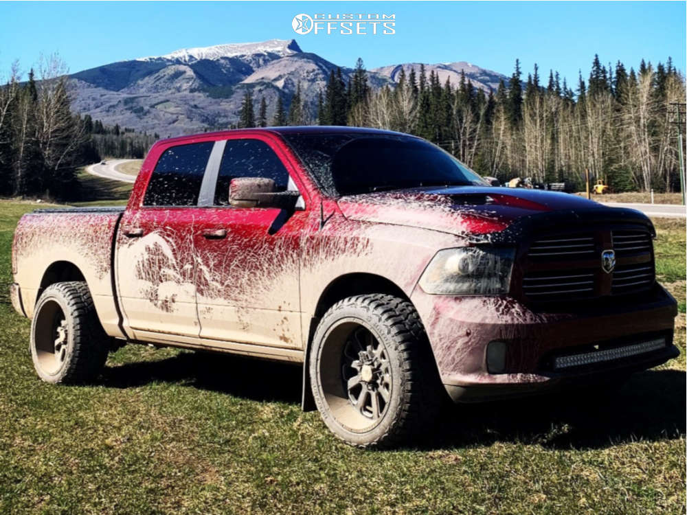 2017 Ram 1500 with 22x12 -44 XF Flow XFX-302 and 33/12.5R22 Nitto Recon ...