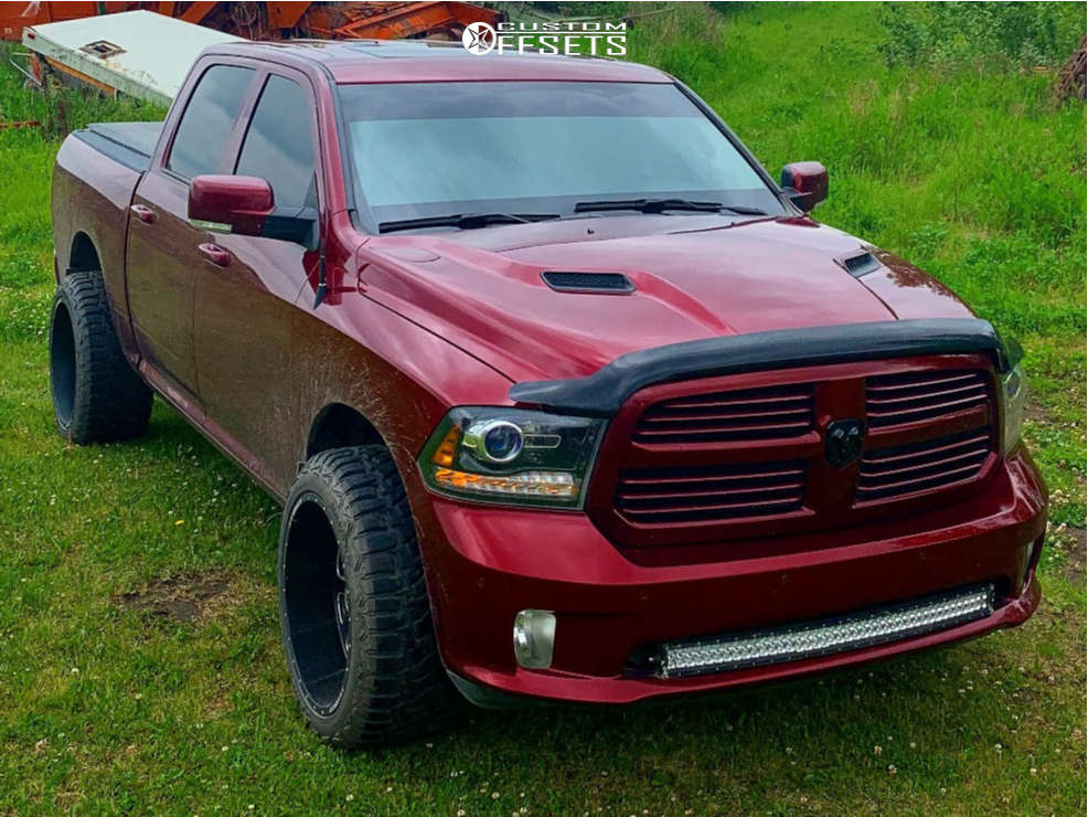 2017 Ram 1500 with 22x12 -44 XF Flow XFX-302 and 33/12.5R22 Nitto Recon ...