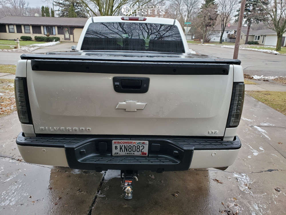 2011 Chevrolet Silverado 1500 with 20x8.5 35 KMC Slide and 275/55R20 ...