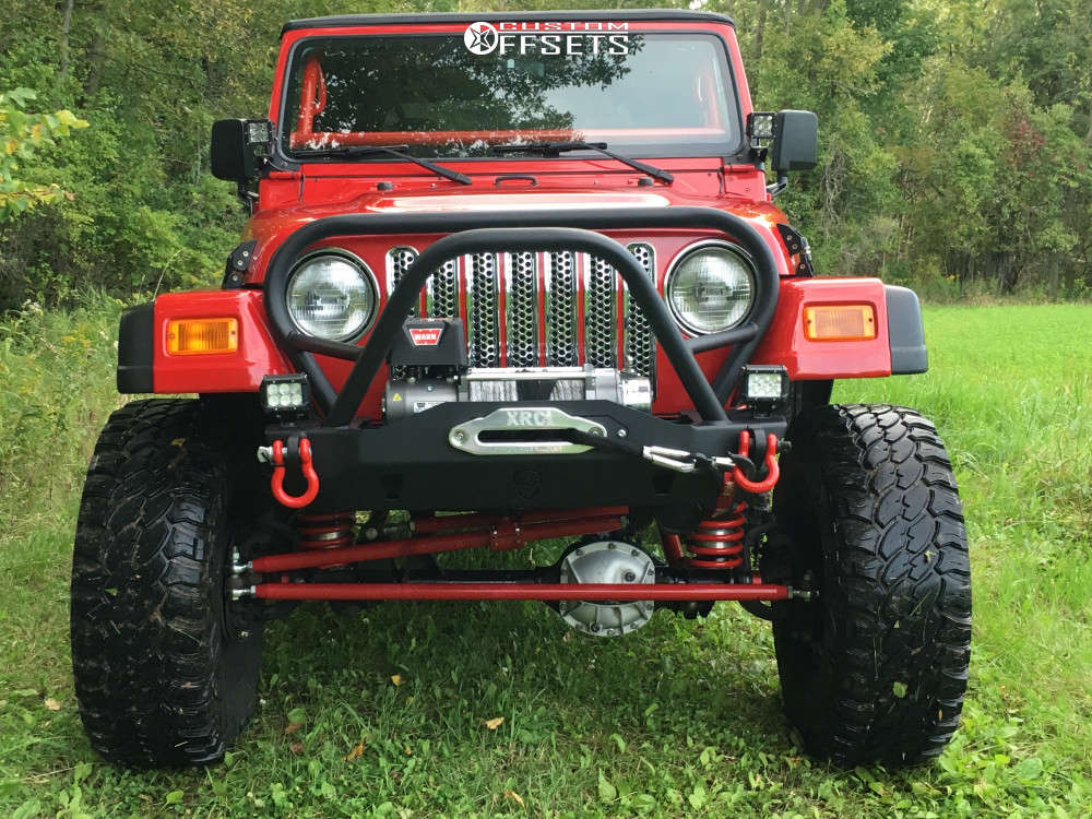 2000 Jeep Wrangler with 15x8 -19 Pro Comp Series 69 and 35/12.5R15 Pro ...