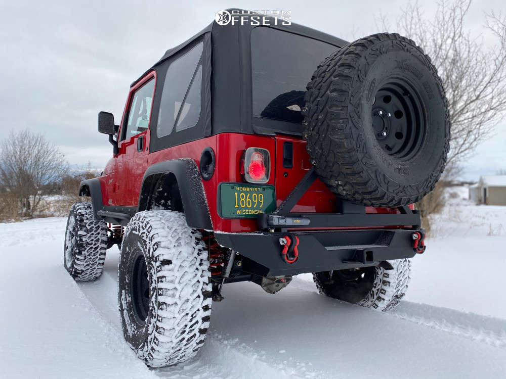 2000 Jeep Wrangler with 15x8 -19 Pro Comp Series 69 and 35/12.5R15 Pro ...