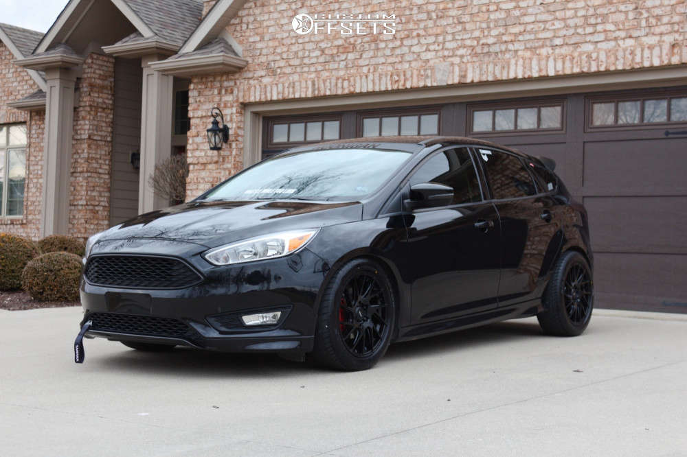 2016 Ford Focus with 17x7.5 40 Voxx Falco and 215/50R17 Riken Raptor ...