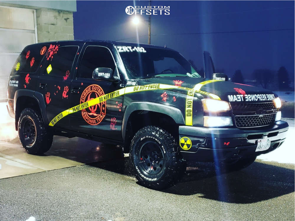 2002 Chevrolet Tahoe with 16x8 American Racing Ar172 and 285/75R16 ...