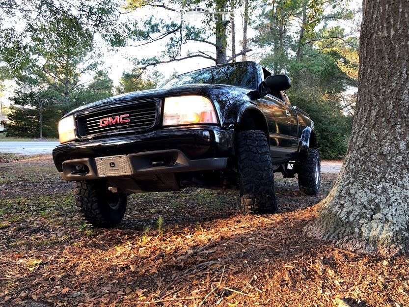1999 GMC Sonoma with 15x8 Vision Sport Mag and 31/10.5R15 Cooper ...