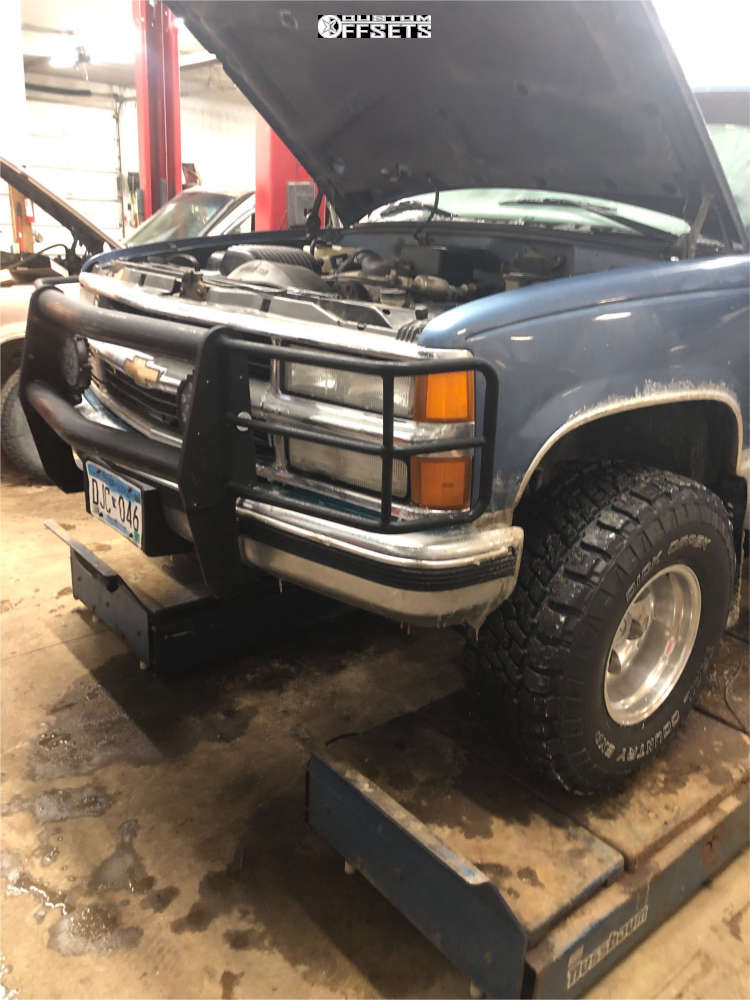 1997 Chevrolet Tahoe with 15x10 -47 Pro Comp Series 69 and 33/12.5R15 ...