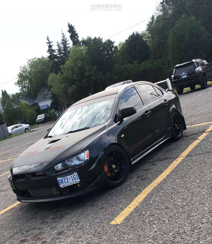 2009 Mitsubishi Lancer with 18x8 45 Enkei Pf01 and 245/40R18 Sailun ...