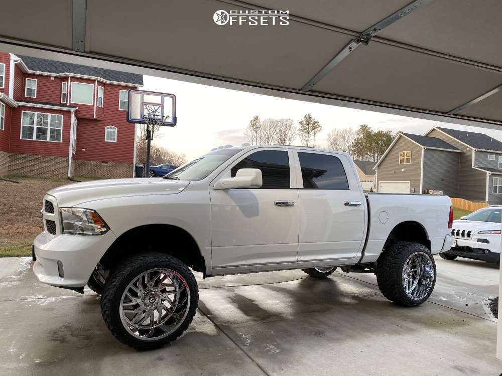 2017 Ram 1500 with 24x14 -76 TIS 544C and 35/13.5R24 AMP Mud Terrain ...