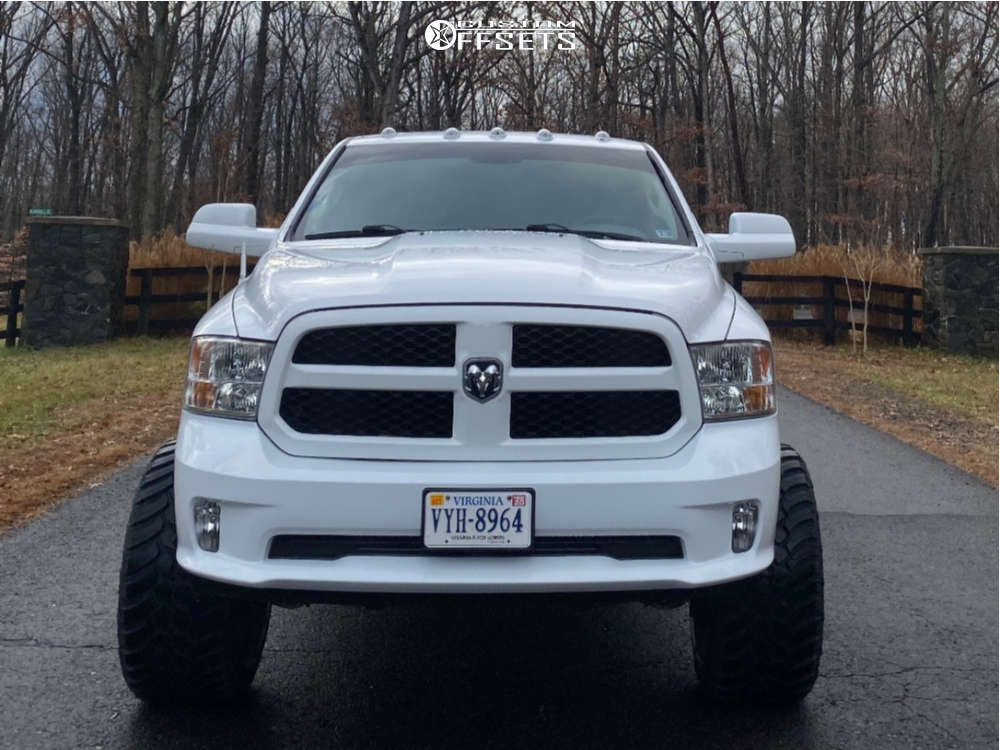 2017 Ram 1500 with 24x14 -76 TIS 544C and 35/13.5R24 AMP Mud Terrain ...