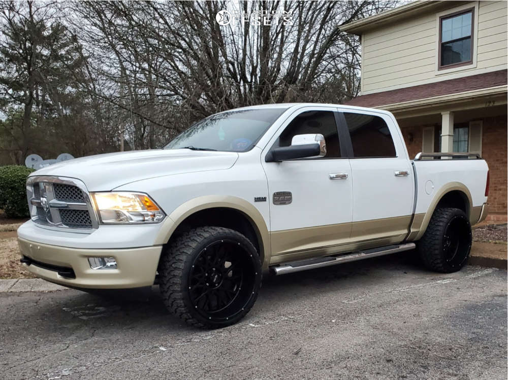 2011 Ram 1500 with 24x12 -51 Vision Rocker and 33/12.5R24 Comforser ...