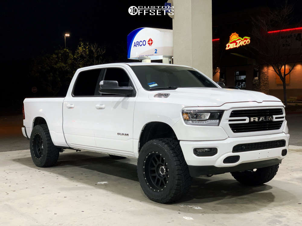2019 Ram 1500 with 20x10 -24 Method Mr606 and 315/60R20 Toyo Tires Open ...