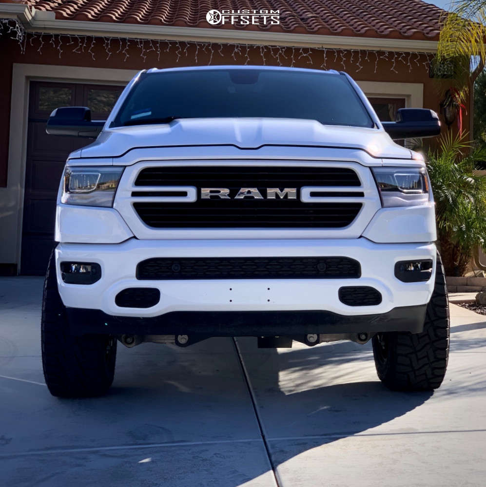 2019 Ram 1500 with 20x10 -24 Method Mr606 and 315/60R20 Toyo Tires Open ...