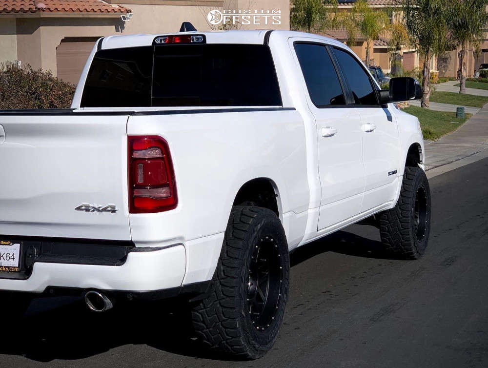 2019 Ram 1500 with 20x10 -24 Method Mr606 and 315/60R20 Toyo Tires Open ...